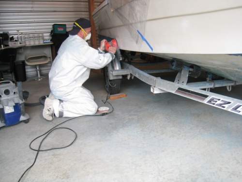 ArimaOwners.com - sanding off the bottom paint